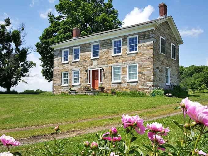 The historic stone building watches over the fields like a proud grandparent admiring their favorite grandchildren.