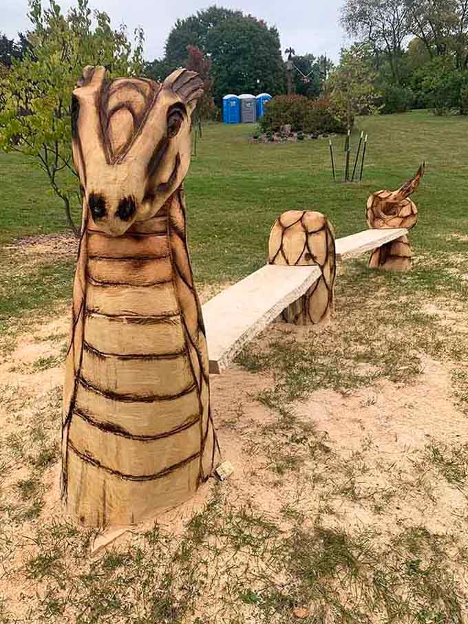 A dragon bench that's equal parts seating and sculpture, because why sit on boring furniture when fantasy is available?