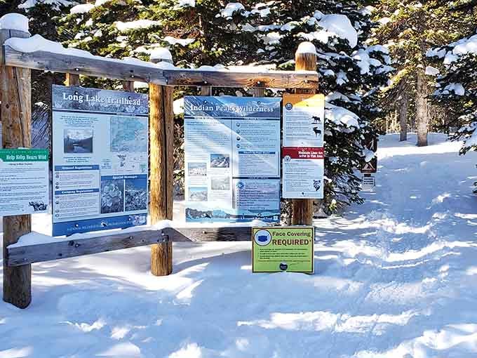The trailhead information board tells you everything you need to know before your alpine adventure begins.