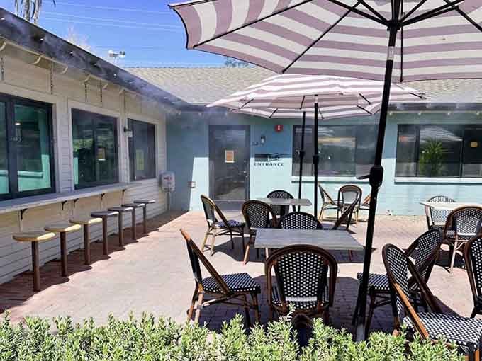 Patio umbrellas providing shade prove that outdoor dining in Arizona is absolutely possible with proper planning involved.