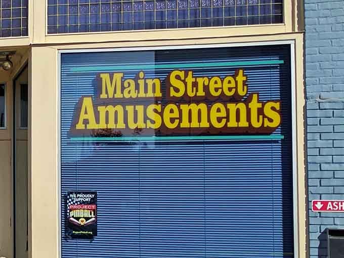 The Main Street Amusements sign outside is your beacon, calling you toward happiness one game at a time.