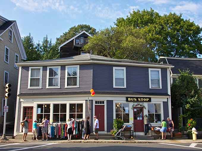 The Bus Stop building draws a crowd, its purple facade and street-level charm making waiting actually enjoyable.