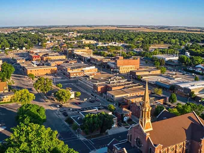 Aerial views reveal a compact, navigable town where everything you need sits within reasonable driving distance.