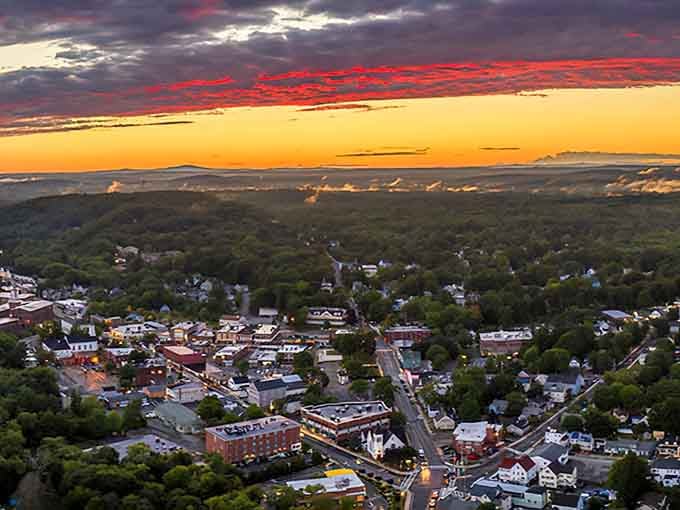 Sunset over Maynard reveals a town nestled in greenery, looking exactly like the hidden gem it actually is.