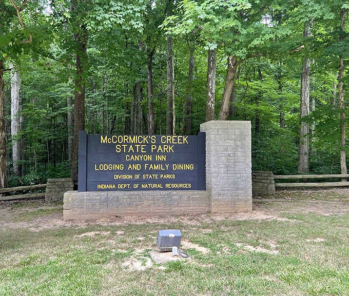 This sign marks the gateway to Indiana's oldest state park, where adventure has been waiting since 1916.