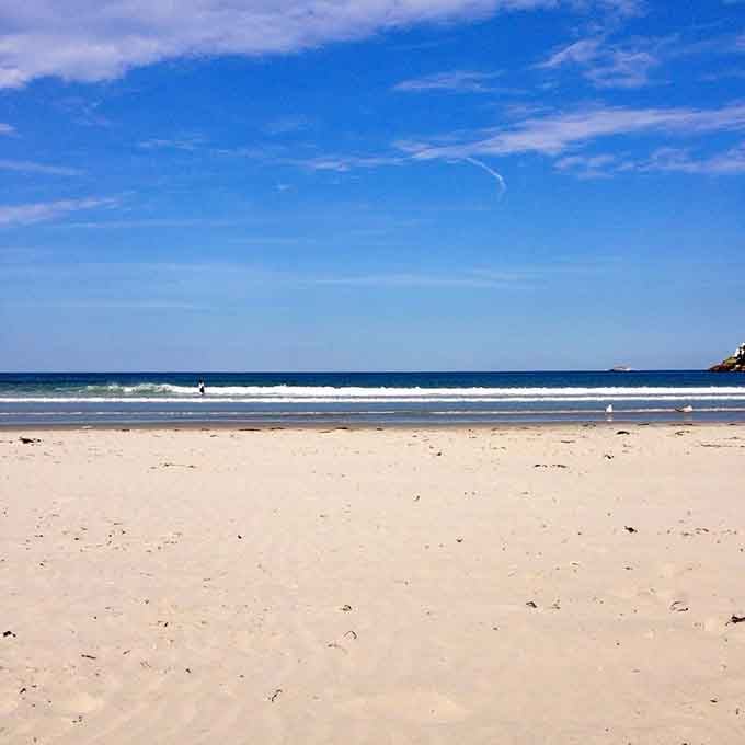 Pure, untouched sand stretching endlessly, inviting you to kick off your shoes and remember what freedom feels like.