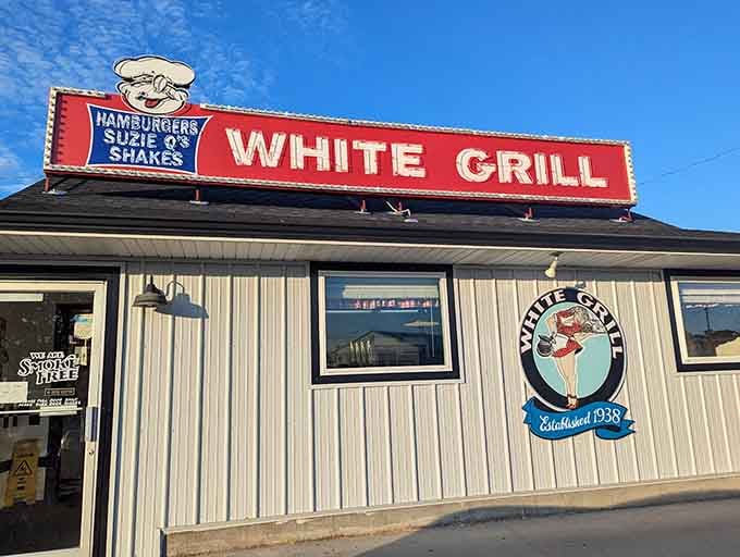 White Grill's retro sign beckons hungry travelers since 1938, serving burgers before "artisanal" became a required menu word.