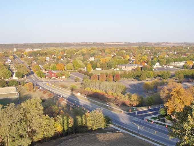 Aerial views reveal a town nestled in autumn colors, looking exactly like a place worth discovering.