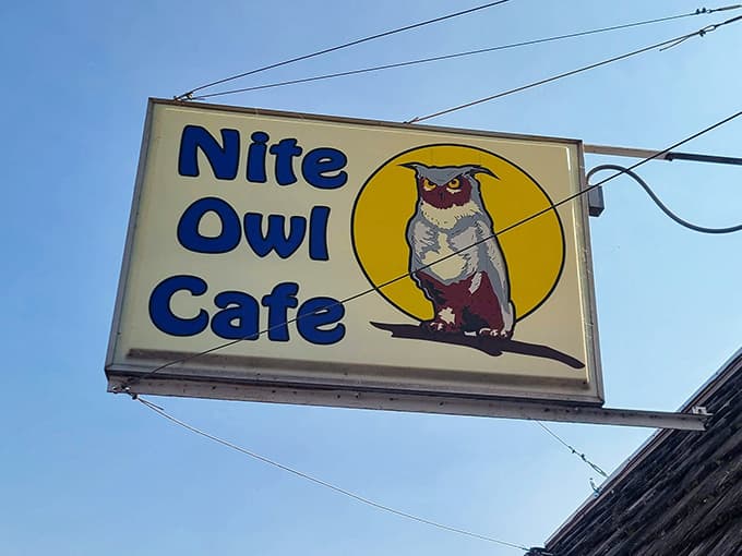 That owl on the sign has been watching over L'Anse for a long time, and it approves of everything.