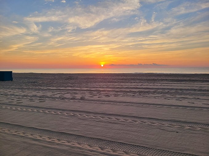 Sunset paints the boardwalk in gold, proving nature's still the best show in town every single time.