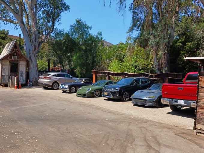 Modern cars meet Old West charm in the parking area of this timeless roadhouse destination.