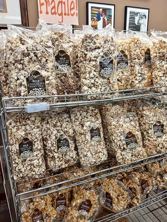 Giant bags of chocolate-covered popcorn that redefine what "movie snack" should actually mean in a perfect world.