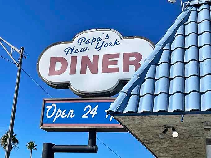 The vintage signage proudly announces what matters most: Papa's New York Diner is open all night long.