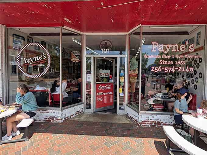 The entrance welcomes you with Coca-Cola signs and an open door policy that's been working beautifully for generations.