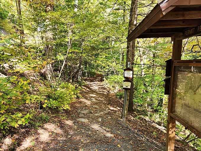 The trailhead beckons hikers toward refreshing waters that make every step of the journey completely worthwhile.