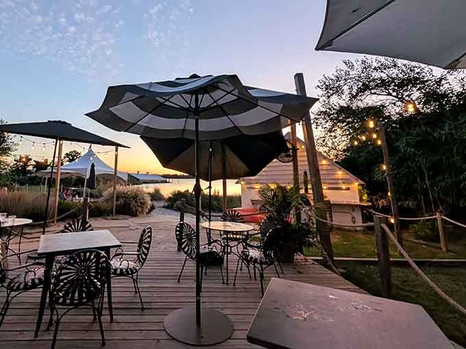 Twilight dining on the deck with umbrellas overhead feels like vacation even when you're just minutes from home.