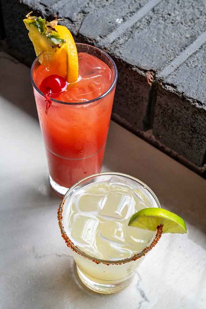 Garnished with peppers and cherries, these cocktails look almost too pretty to drink, but you'll manage somehow.