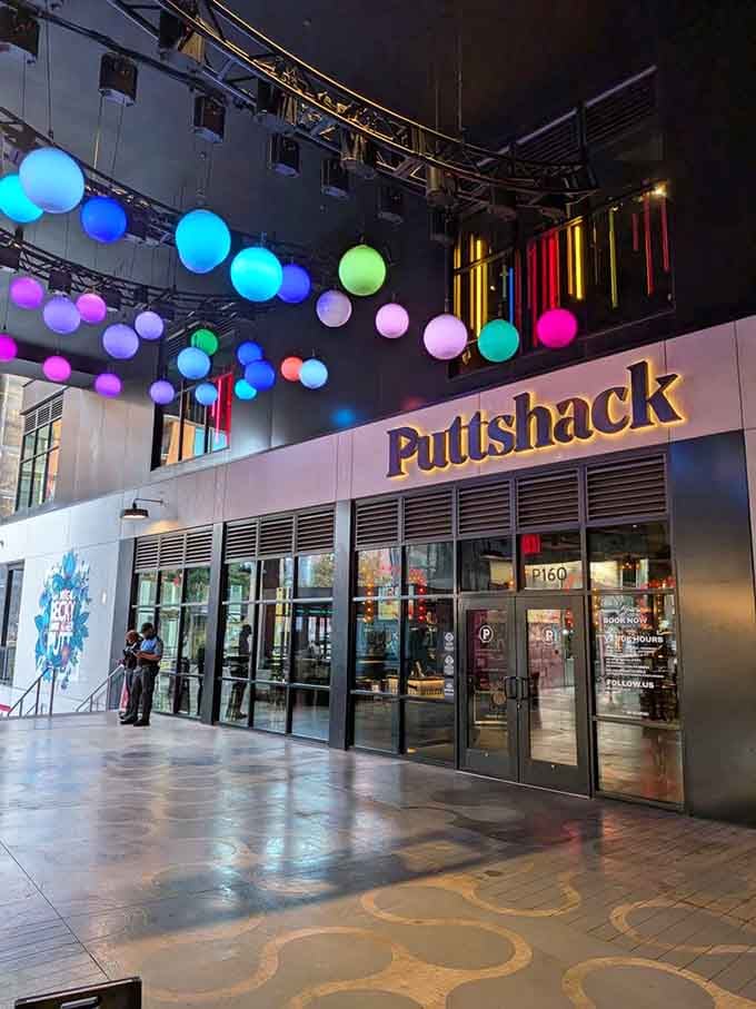 The exterior's colorful glow makes you feel like you're entering Tomorrowland, but for putting enthusiasts instead.