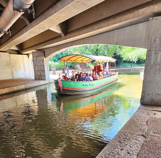 Gliding under bridges reveals hidden perspectives of the city, moments of cool shade punctuating your sun-dappled journey through downtown.