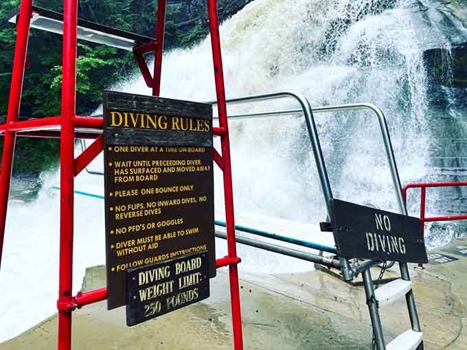 The diving board beckons brave souls to plunge into cold waterfall-fed pools, no wetsuits allowed here.