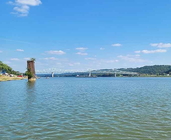 The Ohio River stretches wide and inviting, promising adventures that'll make your neighbors' vacation stories seem downright boring.