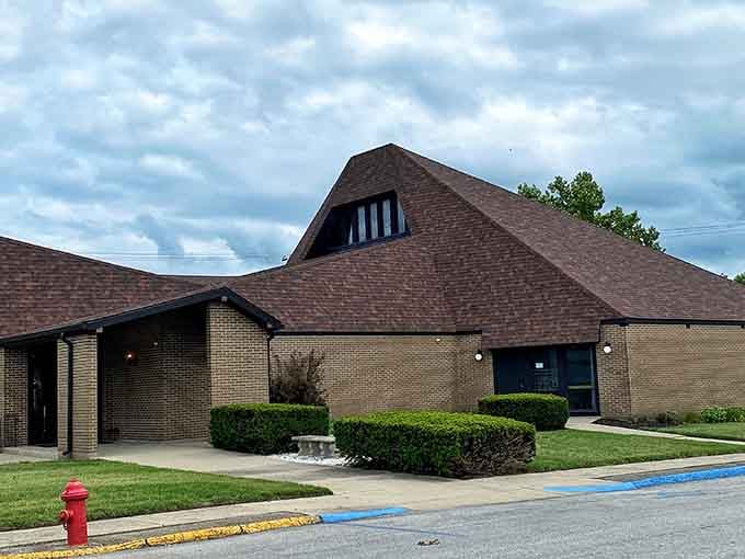 A small-town church anchors its community with quiet dignity, standing watch over the neighborhood it has served for generations.
