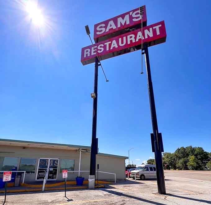 The classic roadside sign beckons travelers like a delicious beacon along the Texas highway.