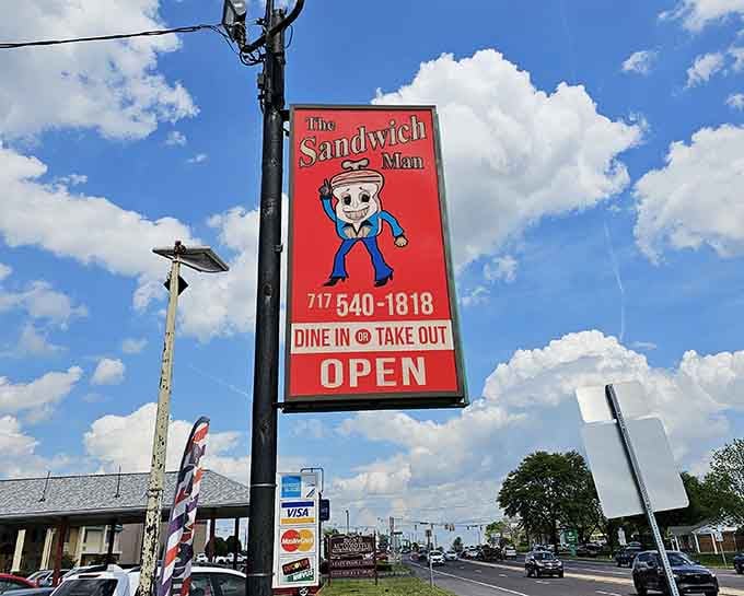 That cheerful sign promises both dine-in and takeout options for maximum sandwich accessibility and convenience.