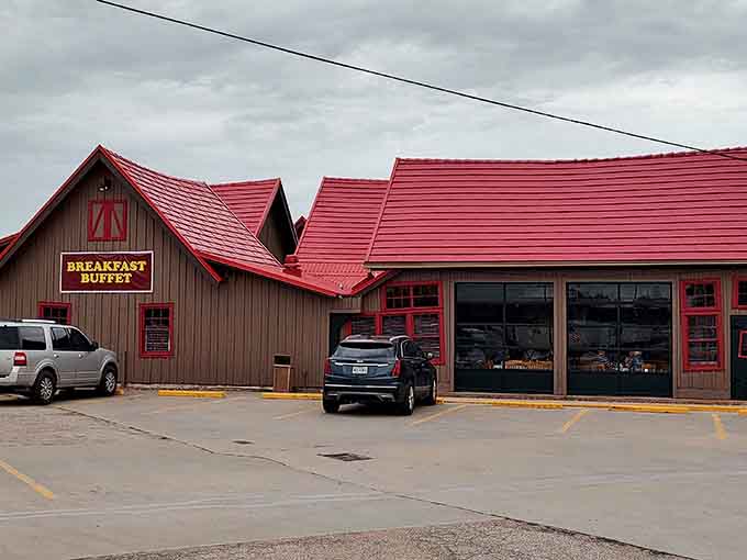 Oakridge Smokehouse's distinctive red roof signals that serious barbecue awaits inside, no fancy marketing required for quality meat.