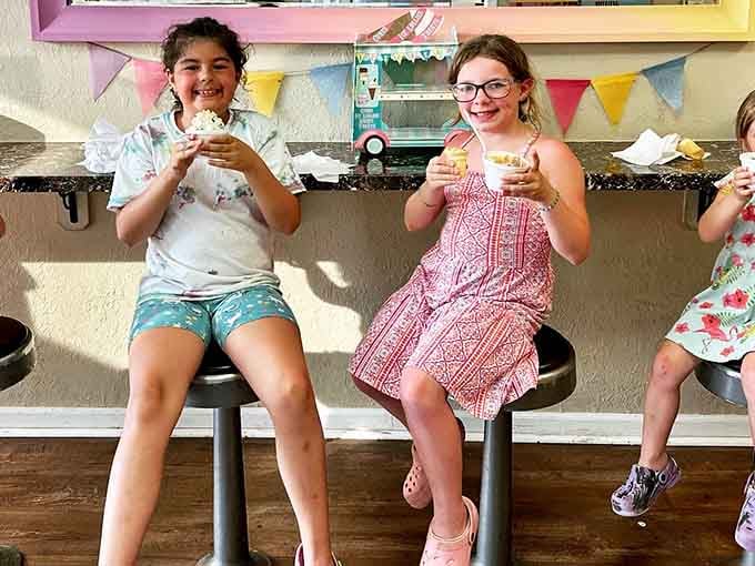 Pure happiness captured in a single moment, proving ice cream remains the universal language of summer joy.