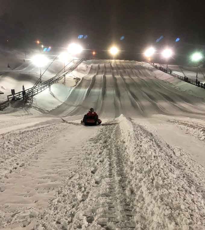 Night tubing adds drama and lights to your downhill adventure, like Broadway decided to do winter sports.