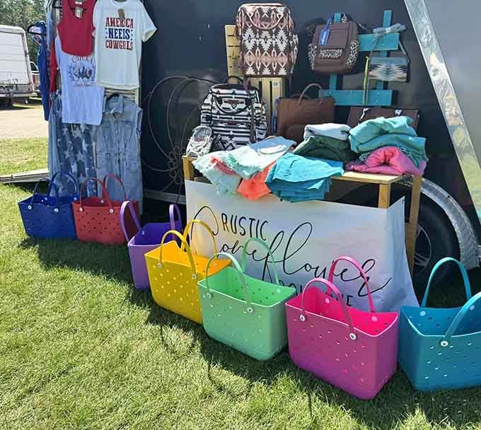 Colorful totes lined up like a rainbow of possibilities, ready to carry home all those "essential" finds you're about to make.