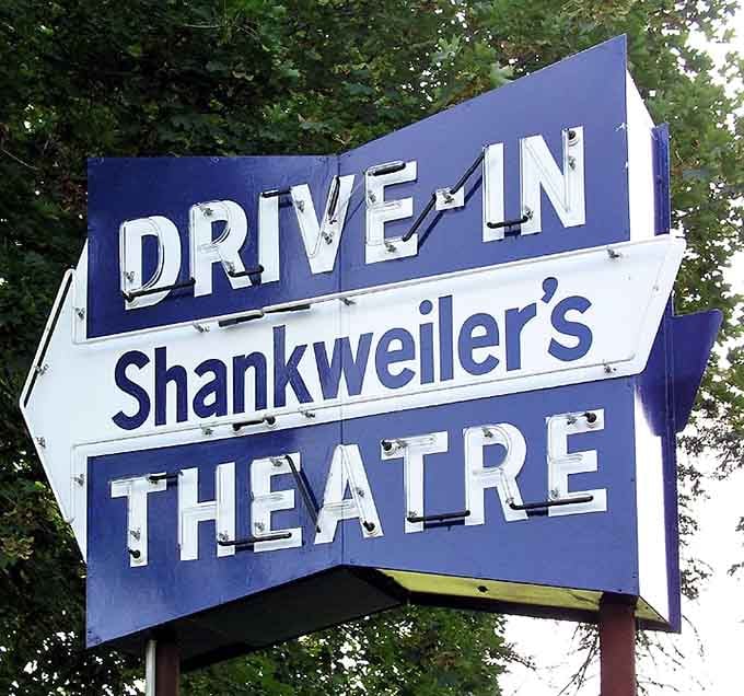 That weathered blue sign has been pointing the way to movie magic for longer than most of us.