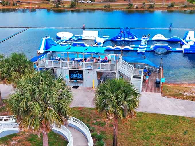Aerial perspective reveals the full scope of this floating playground paradise nestled in West Palm Beach's natural beauty.
