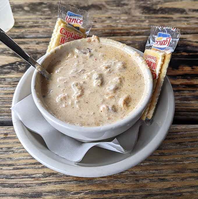 Creamy clam chowder with crackers, warming your soul one spoonful at a time on the Georgia coast.