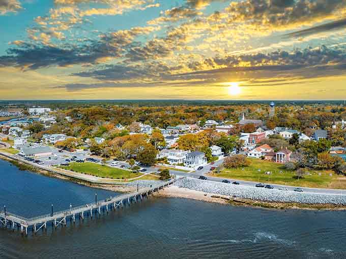 Aerial views reveal Southport's perfect positioning where river meets ocean, explaining why settlers chose this spot centuries ago.
