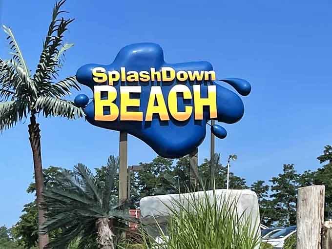 The iconic SplashDown Beach sign welcomes you to a place where adulting takes a well-deserved vacation.