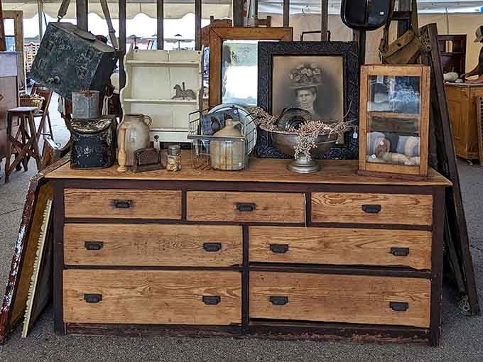 That dresser topped with sepia photographs holds memories in every drawer, waiting to store your own family's treasures next.