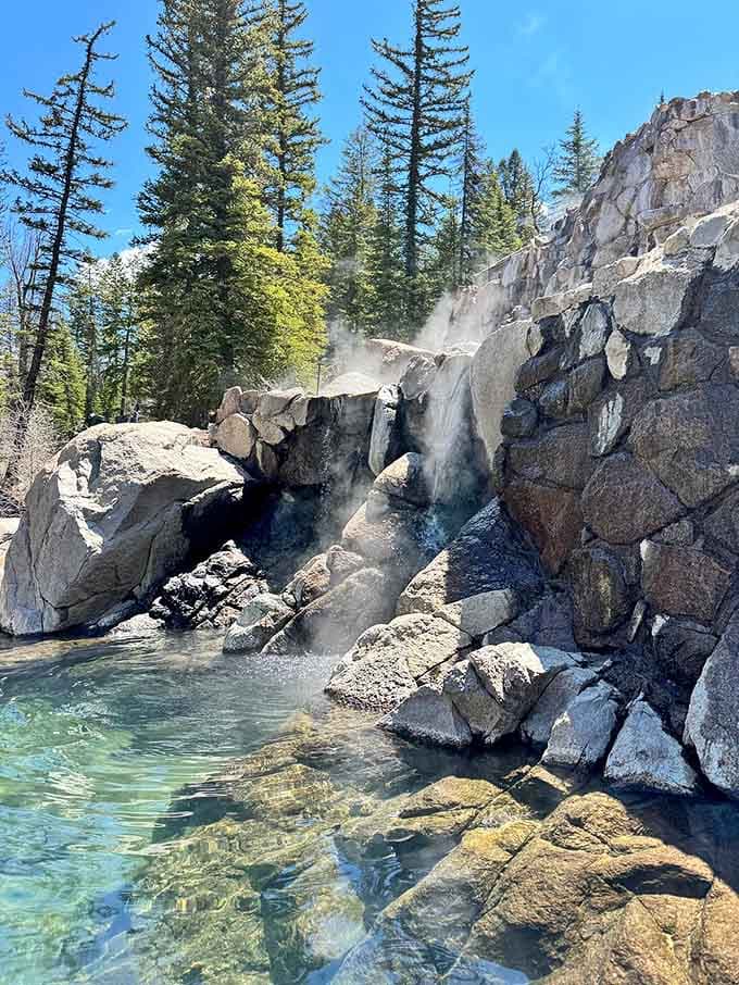The upper pools steam dramatically against the rocks, looking exactly like the secret hideaway you've been searching for forever.