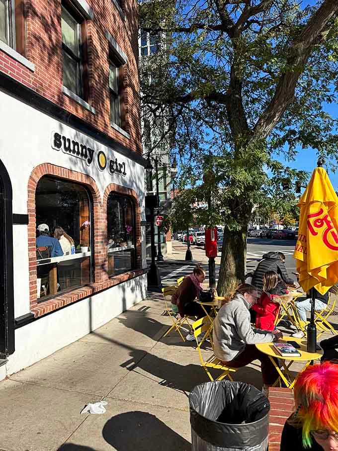 Outdoor seating on a perfect day in Roslindale—breakfast tastes better when you're people-watching with your sandwich.