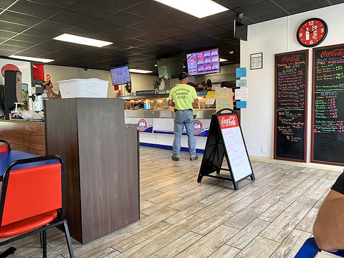 The command center where magic happens, orders fly, and fried chicken dreams become delicious reality daily.