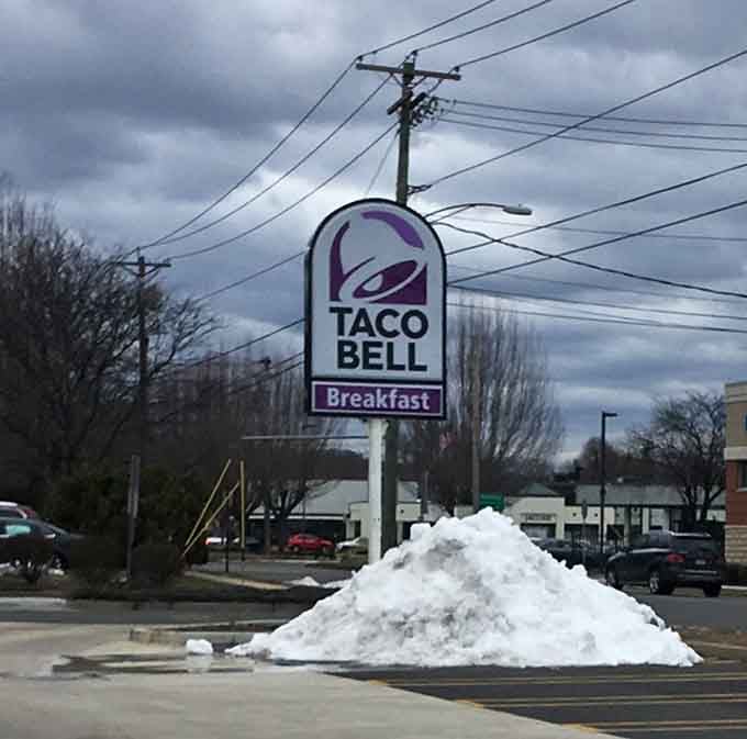 That iconic purple bell signals you've arrived at something special, even in a snowy parking lot.