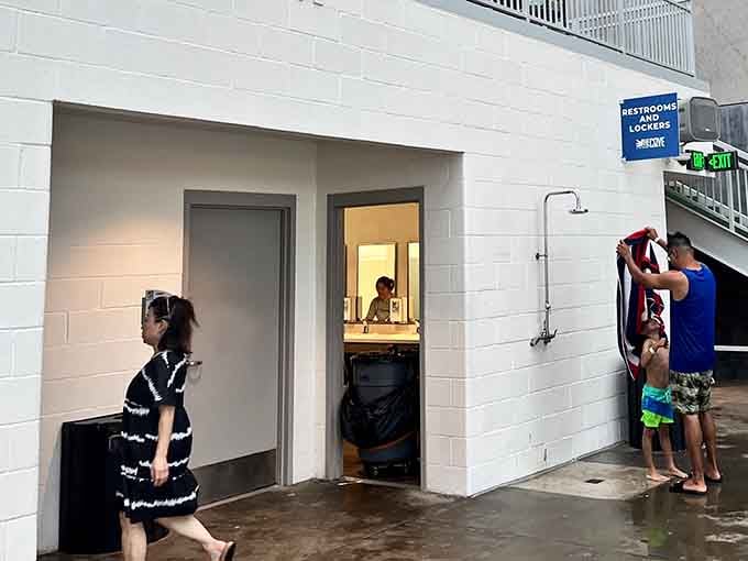 Outdoor shower stations for rinsing off before heading home, because nobody wants chlorine hair in the car.