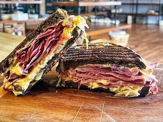 That towering Reuben sandwich stacked with corned beef is basically a love letter to your hungry stomach today.