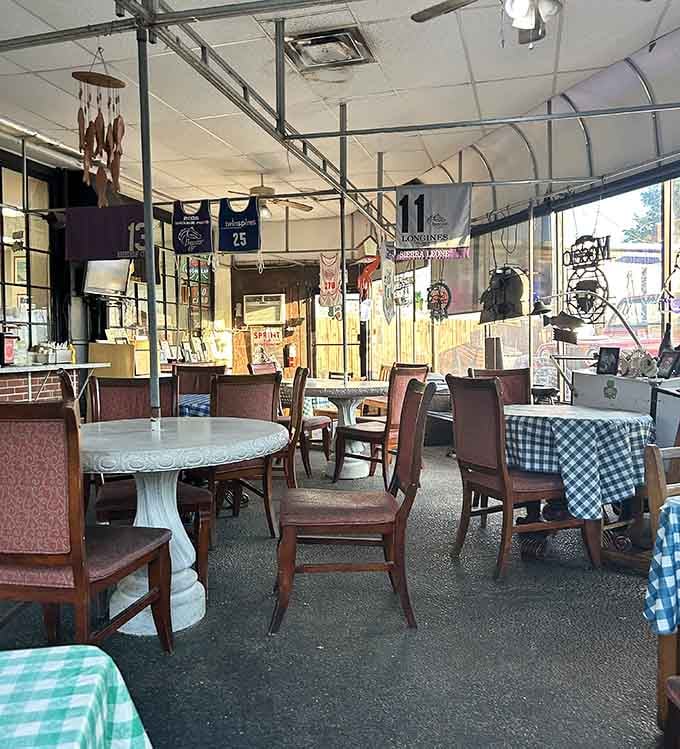 Another angle reveals the eclectic charm inside, where mismatched decor somehow creates the perfect atmosphere for enjoying great seafood.