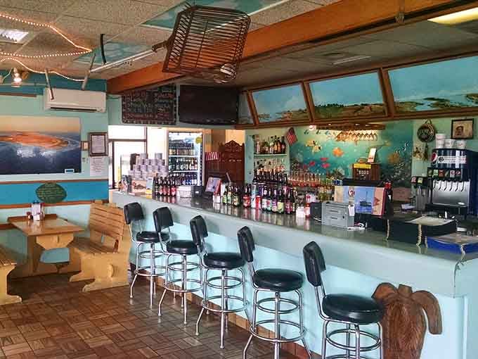 Counter seating with crab-backed stools, because even the furniture here celebrates the Chesapeake Bay's greatest hits.