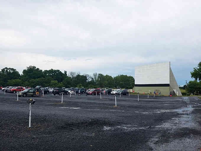 Rain or shine, this gravel lot fills up with families ready for their weekly escape into cinema.