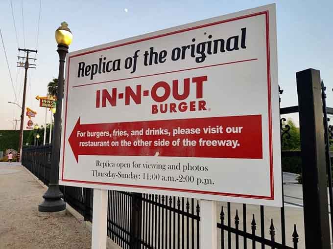 This sign politely redirects hungry visitors to the modern location, because replicas don't serve actual Double-Doubles sadly.