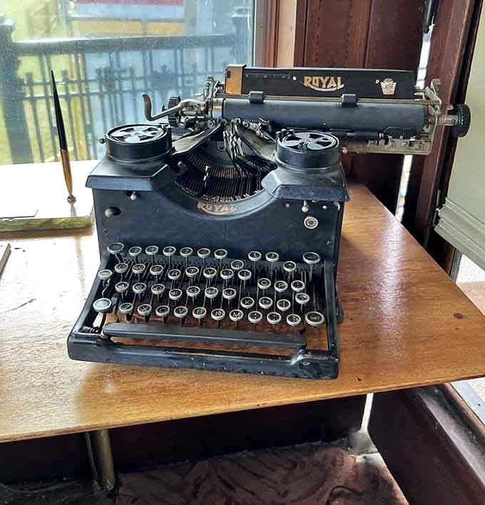 A vintage Royal typewriter sits ready, as if the stationmaster just stepped away for a coffee break.