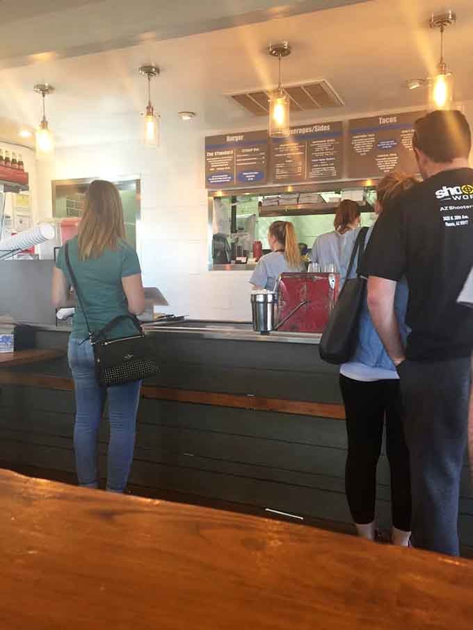 The line of eager customers tells you everything you need to know about what's waiting at that counter ahead.